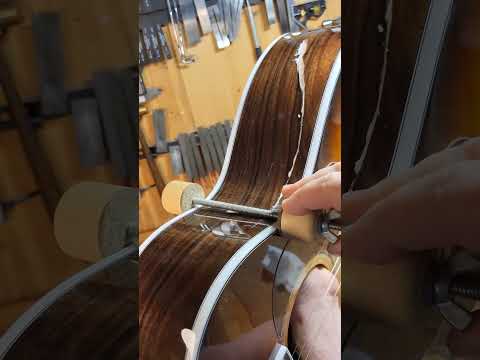 Side crack repair on an acoustic guitar. #luthier #guitarrepair #luthiery #guitar