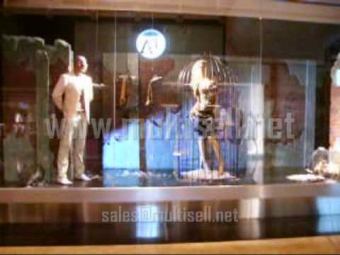 MultiSell INVENT at Harvey Nichols virtual puma in retail window feasting away at Mall of Emirates