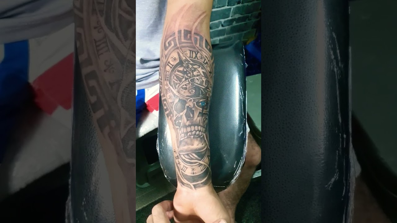 skull  and clock  tattoos