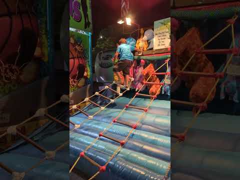 NC State Fair 2023 guys hustling in the games for prizes