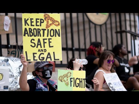 Pro-choice advocates rally on Roe v. Wade reversal anniversary, pro-life advocates celebrate