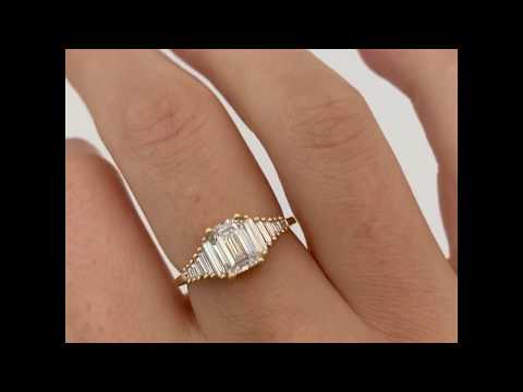 classic Emerald-cut engagement ring with tapered needle baguette diamonds