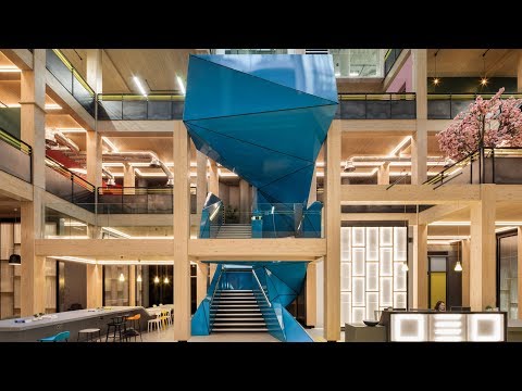 Drone footage reveals 10-storey timber atrium by Studio RHE