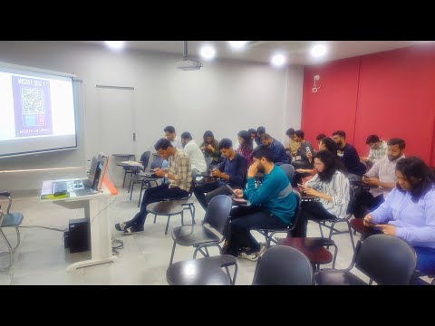 Information systems enable paperless classroom | Students scan a QR code to access their class test