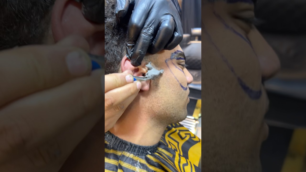 Removing ingrown hair from the ear✂️😂#explore #barber #eidmub #viral #haircut #barbershop #ukbarber