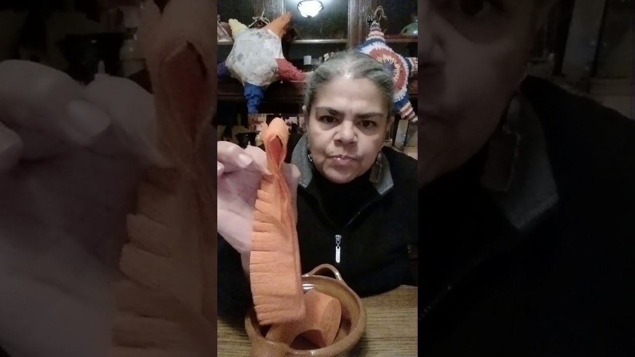 Cutting crepe paper for piñatas