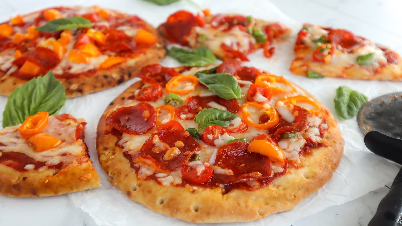 Only 4 Ingredients Easy and Quick Homemade Pizza Baked in just 8 minutes.