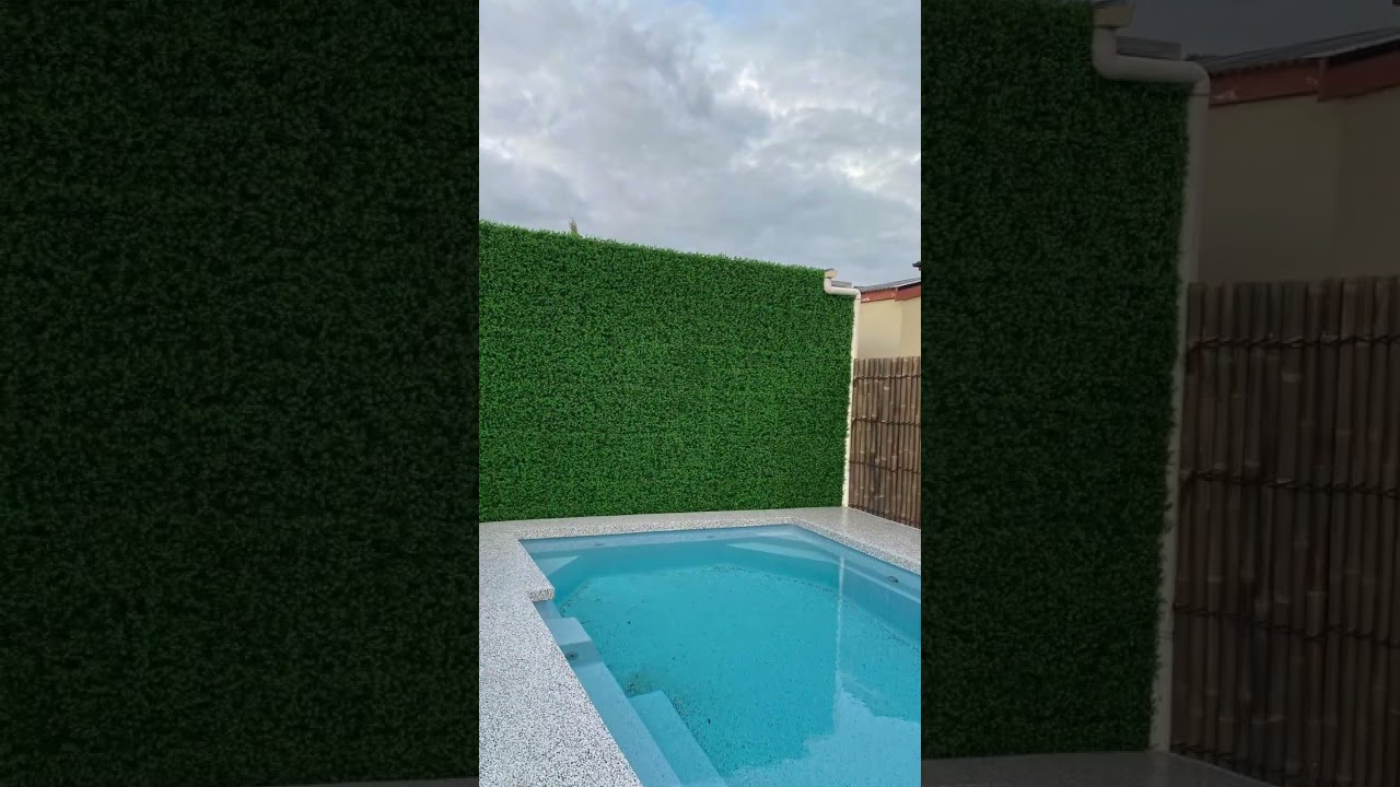 Upgrade your pool with this amazing greenery backdrop! If you want to elevate the vibe of your pool