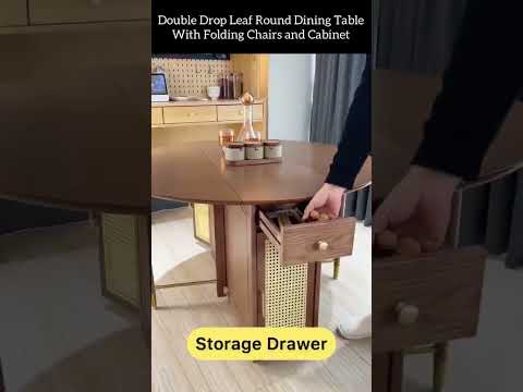 double drop leaf round dining table with folding chairs and cabinet
