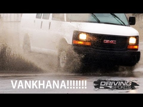 Driving Sports TV - Subaru WRX STI vs. Cargo Van Battle!