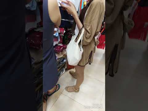 Thai tourist shopping at Saigon Square...