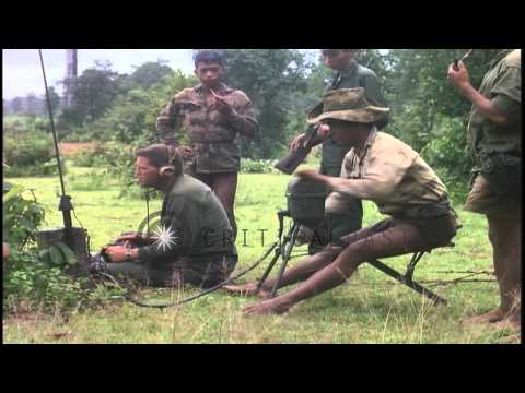 US M/Sgt. Richard E. Pegram uses an AN/GRC-9 radio set in a Vietnamese jungle d...HD Stock Footage