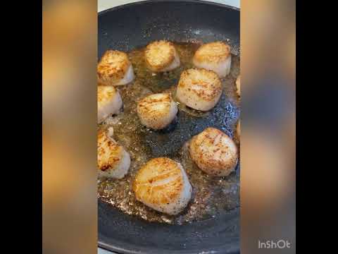 Scallops scampi over linguine