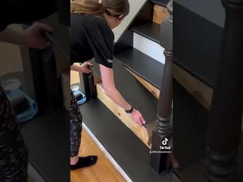 New Tread and Riser Installation - Black Hardwood Stair Makeover from Carpet #staircase #painting