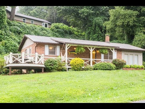 Updated & Charming Ranch 3/2 with great front porch views and convenient to town