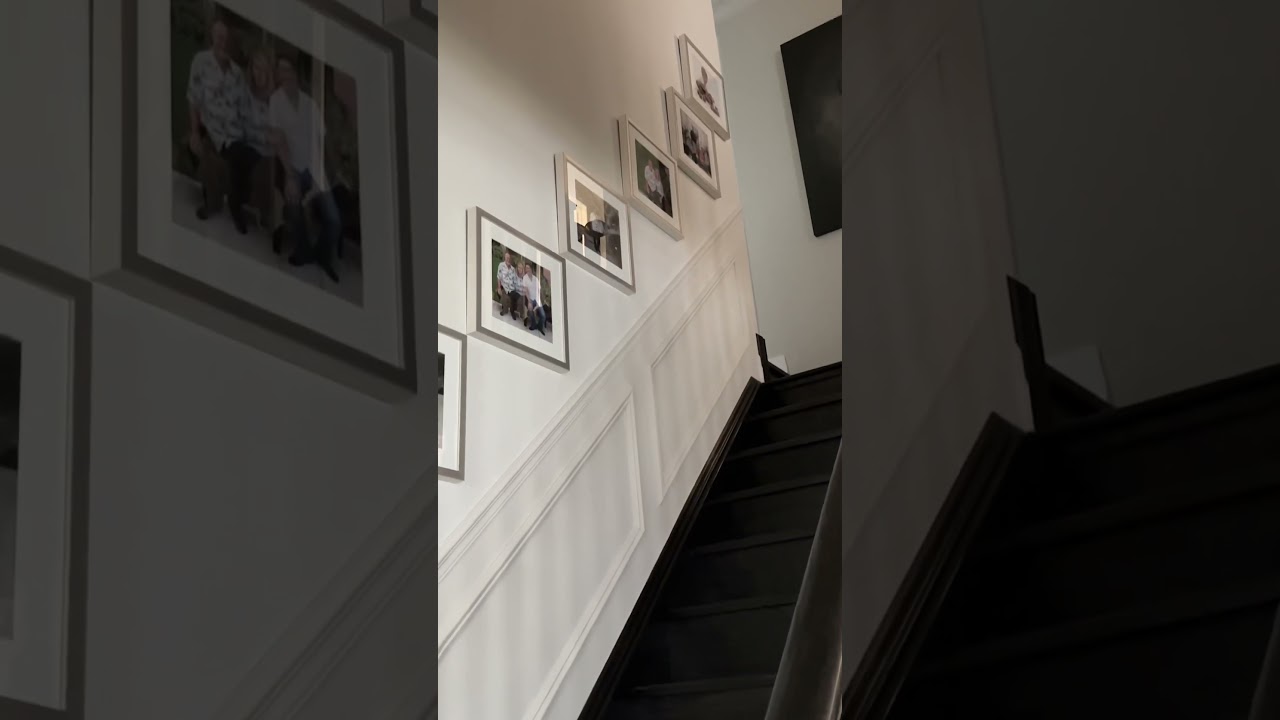 Family photos we hung going  along the stairs.