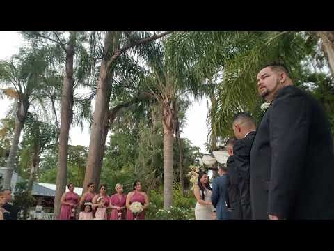 Couple Exchanges Vows at Beautiful Paradise Cove in English and Spanish