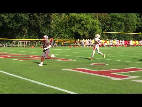 SJC #12 Kevin Doyle shuffle pass to #3 Ron Cook for the TD