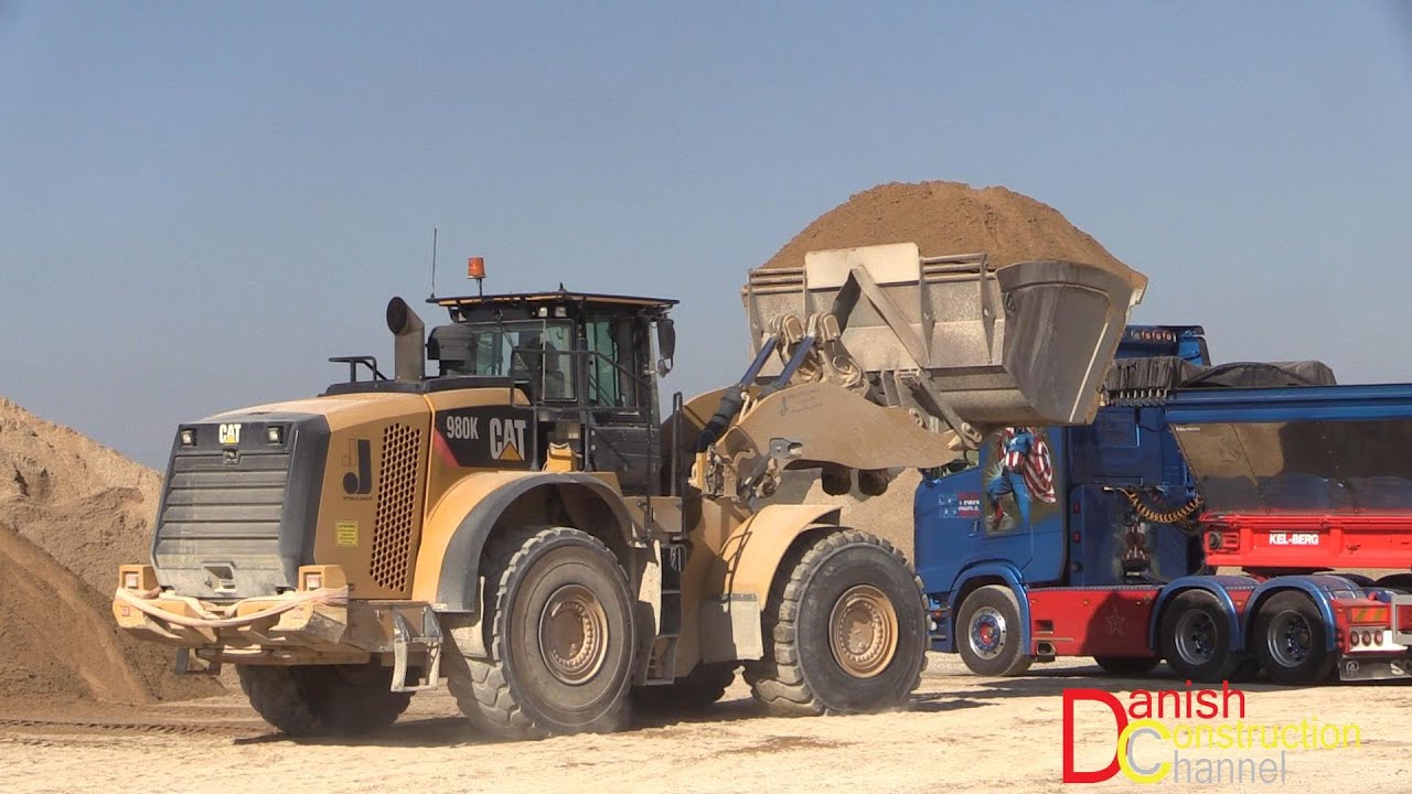 Cat 980K Loading Scania And Volvo Trucks