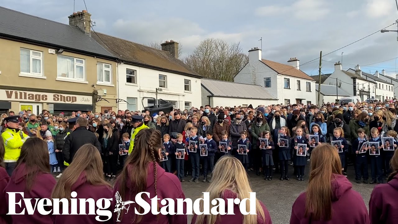 Huge crowds line the street for Ashling Murphy's funeral
