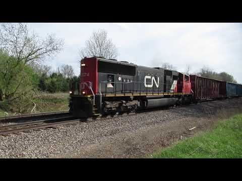 CN 5774 zips East with local delivery freight train past Vicksburg, MI