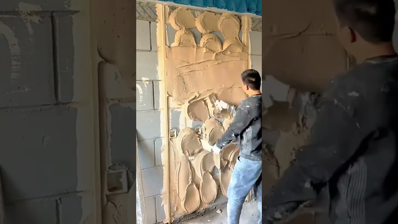 Applying Thick Plaster Layers on Brick Wall Using Trowel for Smoothing