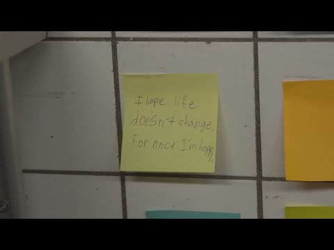 Artist displays feel-good messages on New York subway walls