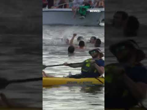 WATCH: Greasy pole contestant nabs the flag in Friday's competition