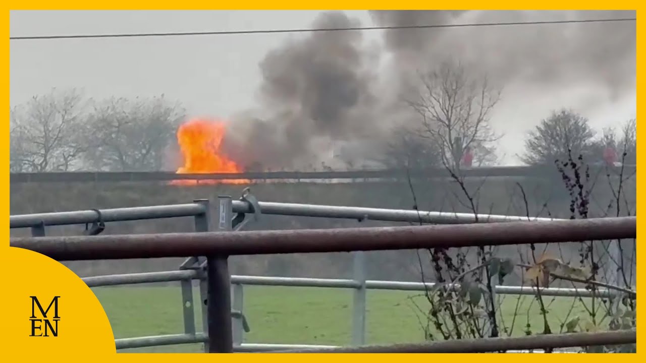Horrifying moment car bursts into flames on M61 after crashing as ...