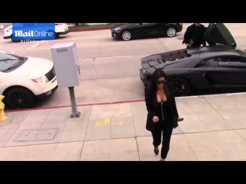 Kim Kardashian pops out of corset when out with Kanye Daily Mail Online
