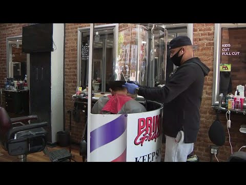 NJ barber creates shields on wheels to keep customers healthy