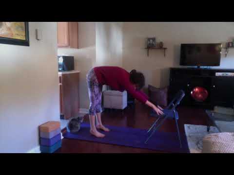 How to do Downward Facing Dog using a chair as a prop.