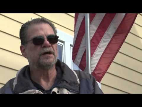 Racine man flies flag upside down