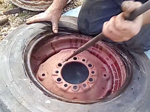 Fixing front tractor tires Old School by hand