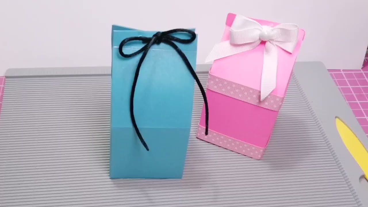 Cómo hacer una caja tipo cartón de leche con la tabla plegadora.