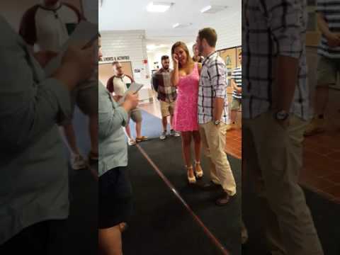 Chris Weachter and Anna O'Connor lavaliering Pi Kappa Phi Beta Xi chapter