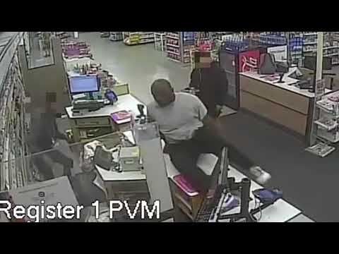 RAW: Man Fights Walgreens Cashier for Drone