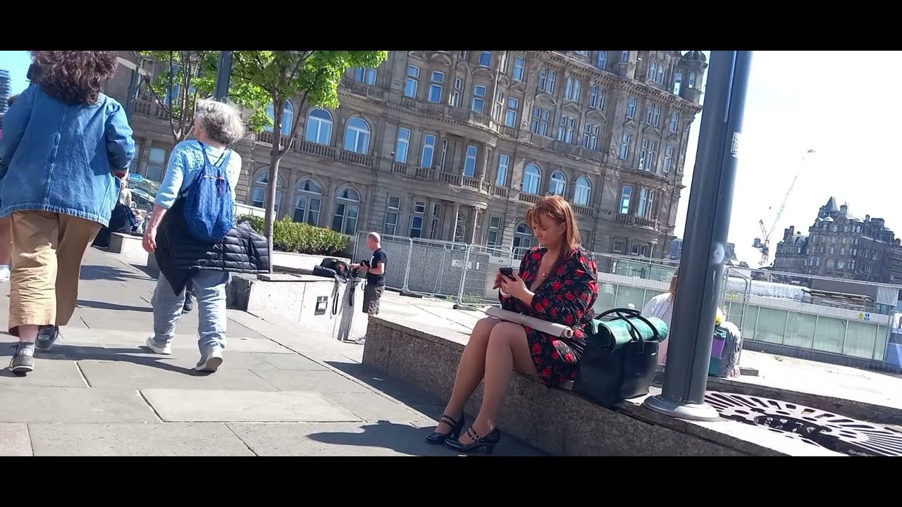 Candid woman wearing a short summer dress