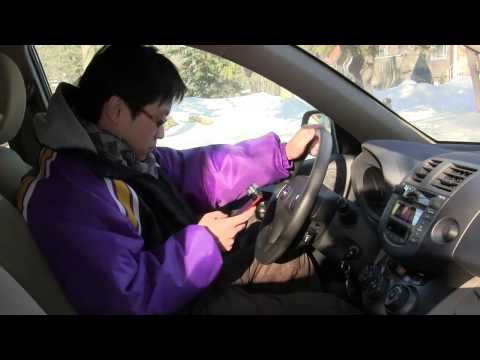 Surround-See: Enabling Peripheral Vision onSmartphones during Active Use