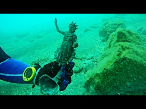Divers discover ancient treasure trove in shipwreck