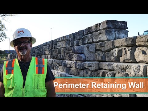 Site Contractor Builds Redi-Rock Perimeter Retaining Wall to Revolutionize Rail Line Project!