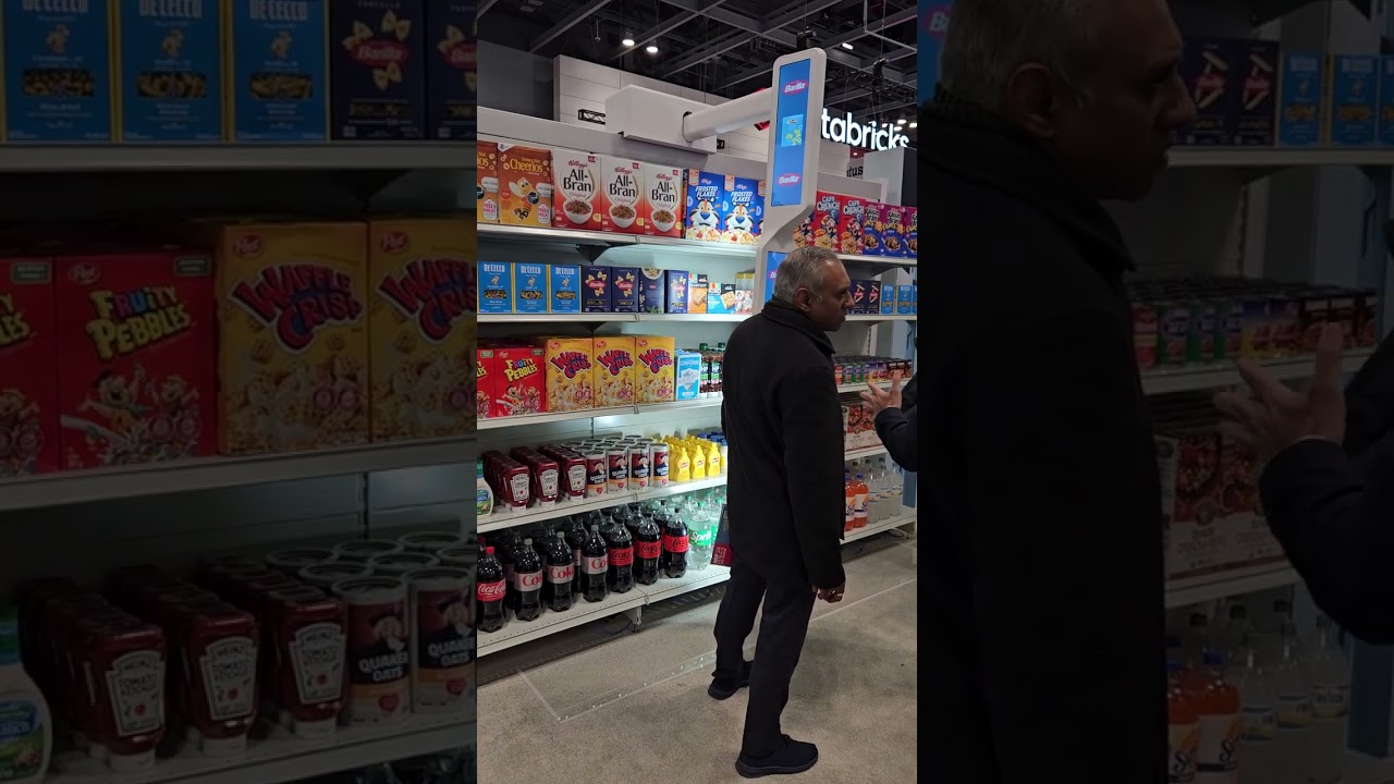 Cust2Mate, Shelfietech at #NRF2024 Shelf scanning rail-based robot