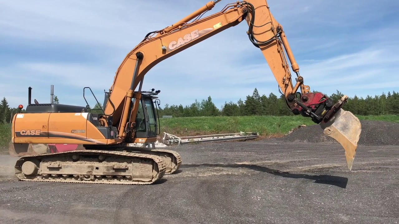 Bandgrävmaskin Case 290B med tiltrotator + skopa