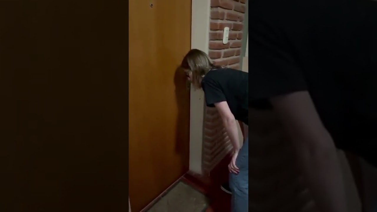 locked outside and the cat opened the door for her