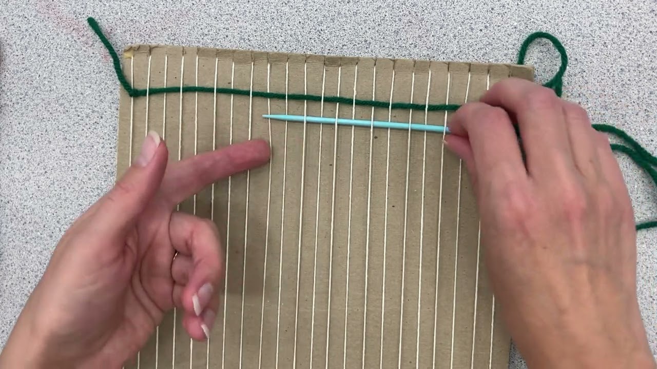 Weaving on a cardboard loom! Day#1
