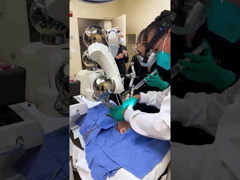 Robotic dental implant clinician Dr. Donald Nikchevich using Yomi