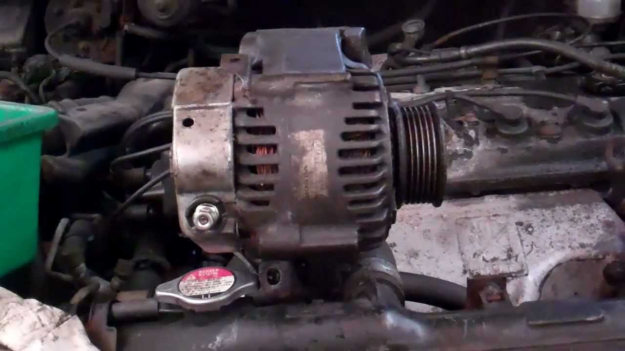 Adjusting alternator belt tension - bolt & pivot bracket design