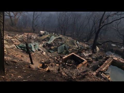 Thousands evacuated in South Africa as storm fans fires