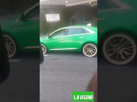 bishop "magic" don juan riding in style chuuch (l.a legend) cadillac xts rolling