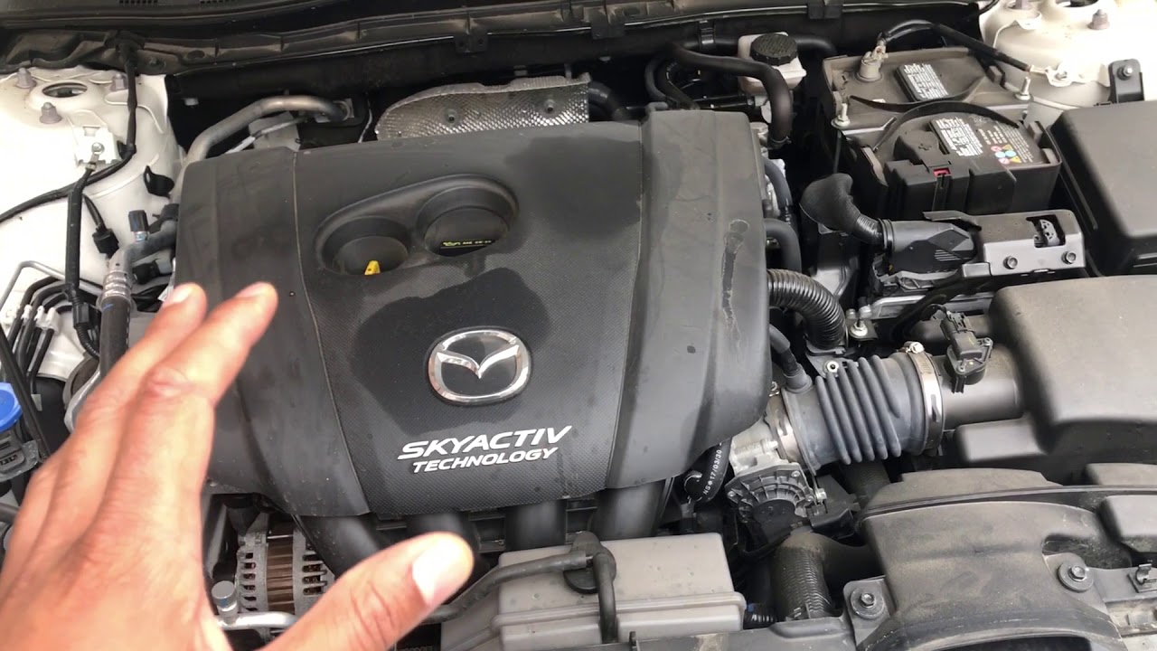 Mazda 3 - The nozzles for adding refrigerant